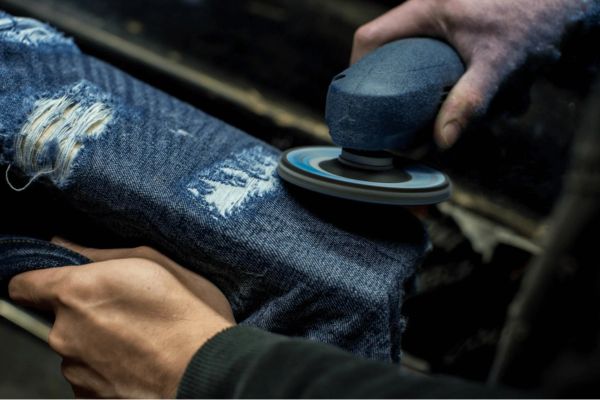 Jeans Grinding Machine Behind Crafting Distinctive Denim Look p Jeans Grinding Machine Behind Crafting Distinctive Denim Look p